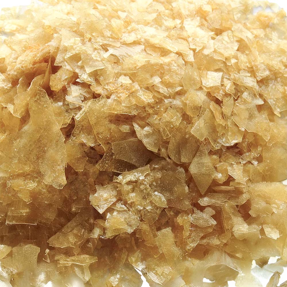 Schellack blond, vaxfri och renad, flingor 100 gram